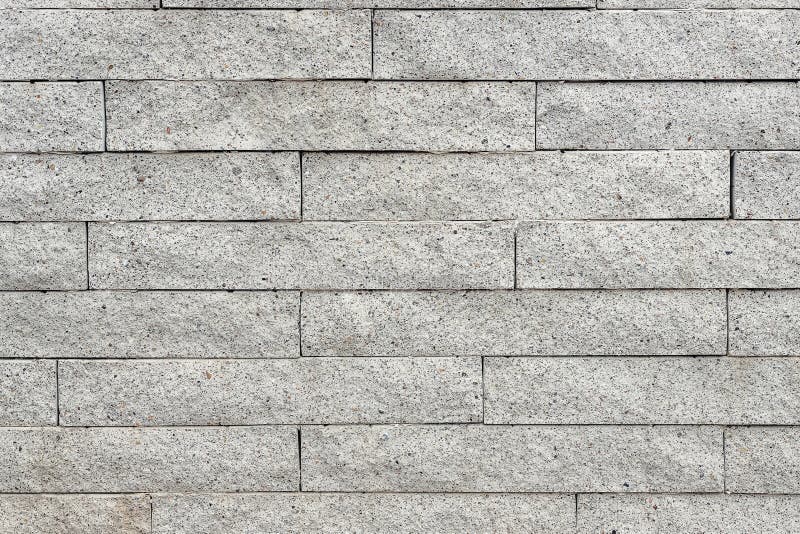 Texture of a Natural Stone Wall Made of Rectangular Blocks As an ...
