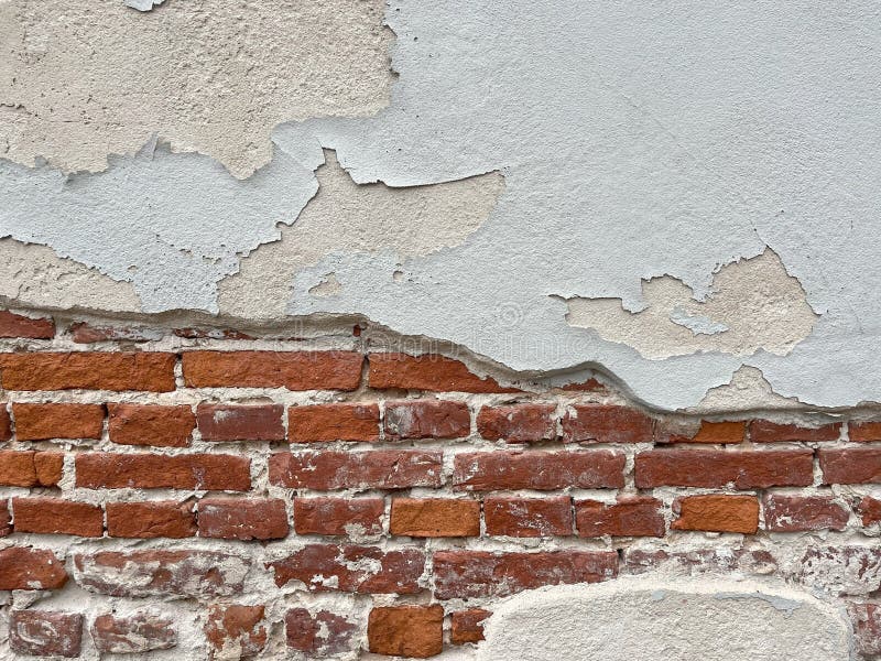 Texture of an Old Brick Wall with Fallen Plaster and Peeling Wall Paint ...