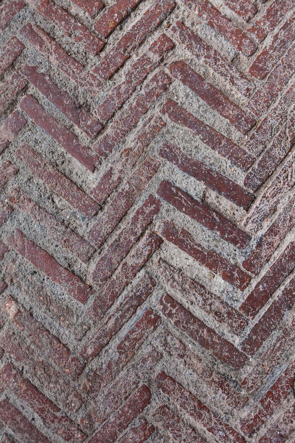 The Texture of the Old Herringbone Pavement of Bricks Stock Photo ...