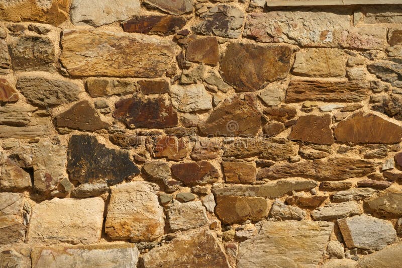 The Texture of the Old Medieval Wall of the House, Lined with Brown ...