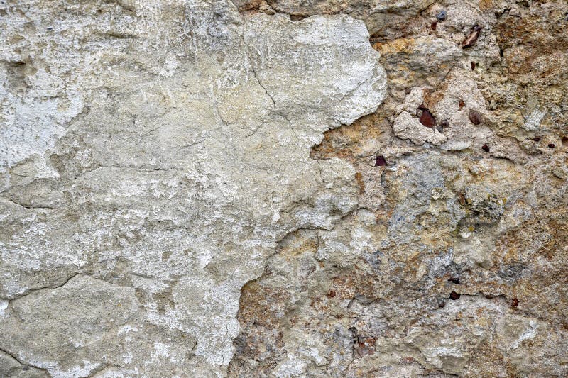 Texture of Old Stone Wall with Collapsed Plaster. Background of Shabby ...