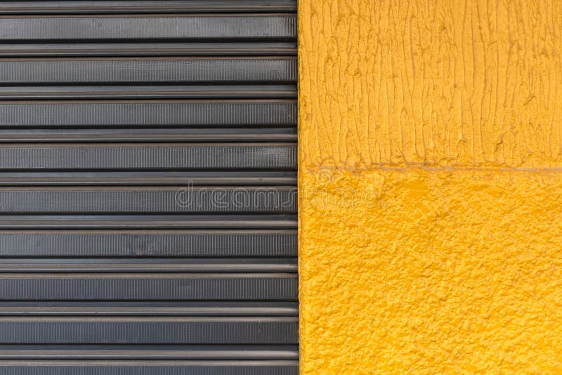 Texture Pattern of Grey Iron Door of Closed Store and Yellow Wal Stock ...