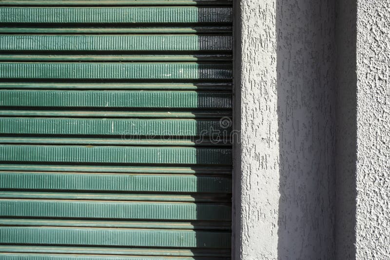 Texture Pattern of Iron Door of Closed Store and Wall Stock Image ...
