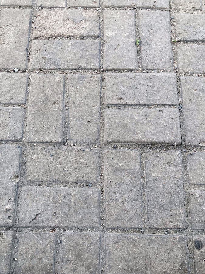 The Texture of the Paved Tile on the Bottom of the Street. Cement Brick ...
