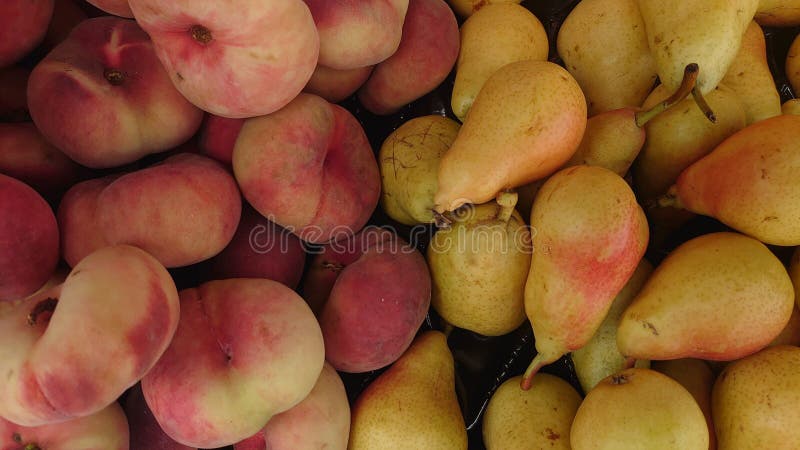 Texture of Peaches and Pears in a Pile in the Market Stock Photo ...
