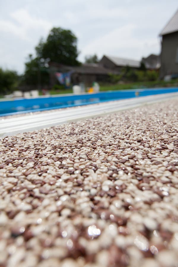 Coloured Concrete Around Pool Stock Photo - Image of exposed, chill ...
