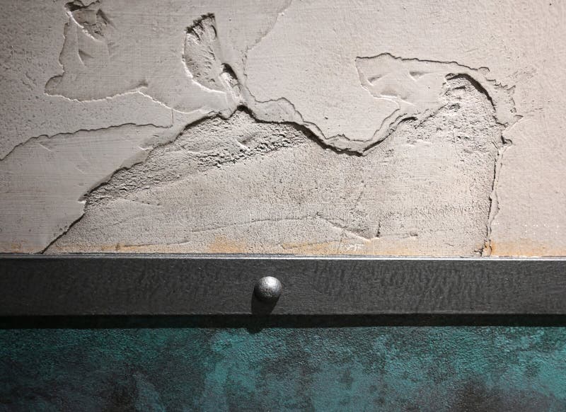 Texture of Peeling Plaster on a Wall Revealing Underlying Layers in an ...