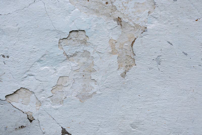 Texture of a Plastered Wall, Painted White, in Places with Pieces of ...
