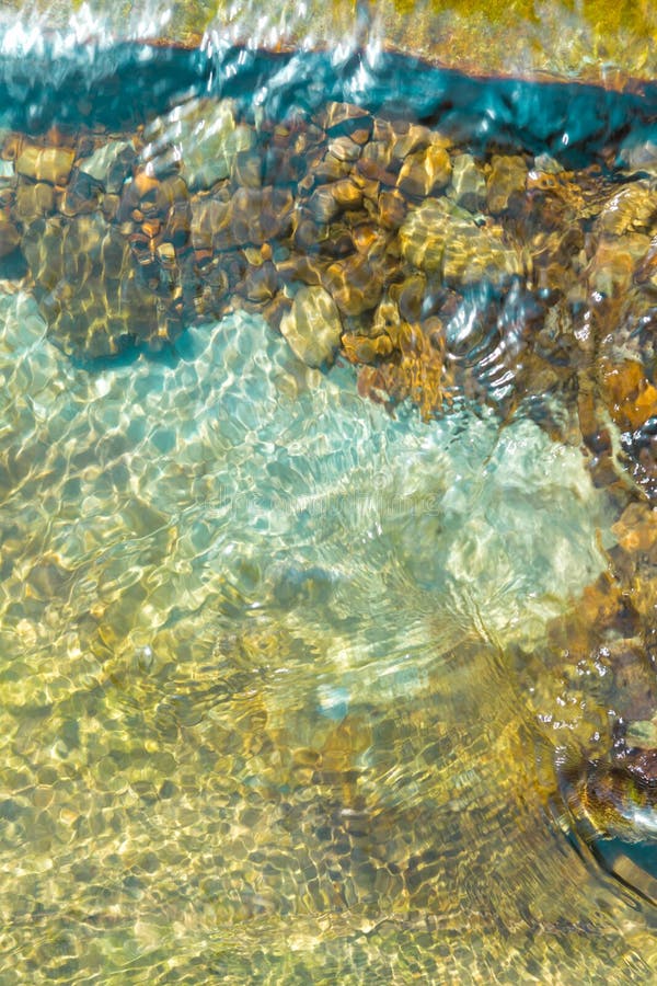 The Texture of the River Bottom through the Water. River Pebbles in the ...
