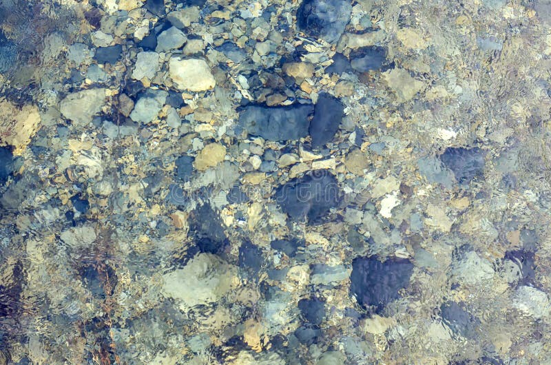The Texture of the River Pebble Bottom in Clear Water Stock Photo ...
