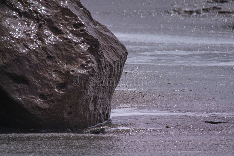 Texture a Rock in the Beach and Tidal Current Stock Photo - Image of ...