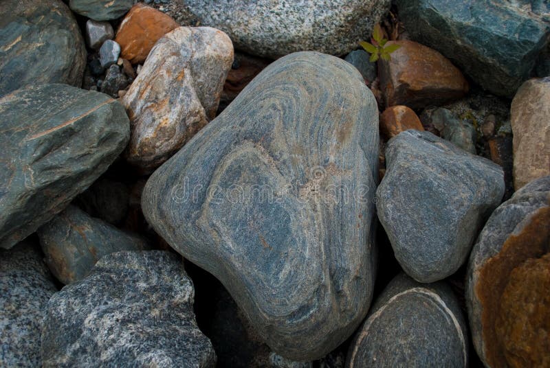 Textured Rocks on River Bank Stock Photo - Image of beach, design ...