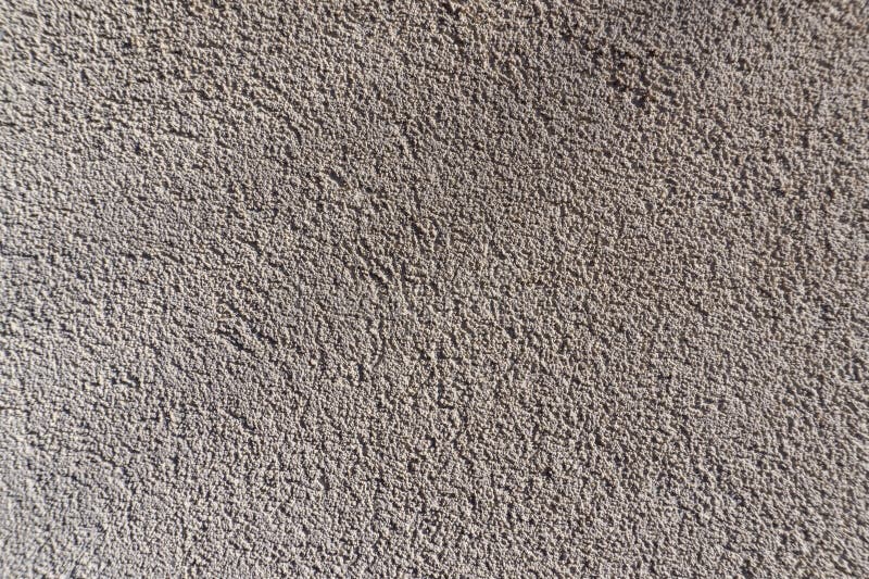 Texture of Rough Plaster on a Wall Illuminated by Sunlight during the ...