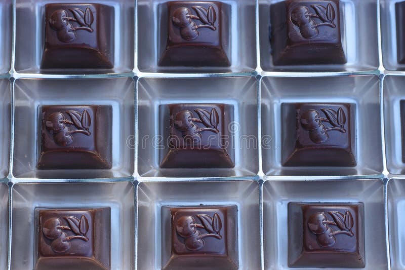 Texture from a Row of Brown Chocolate Candies Stock Image - Image of ...