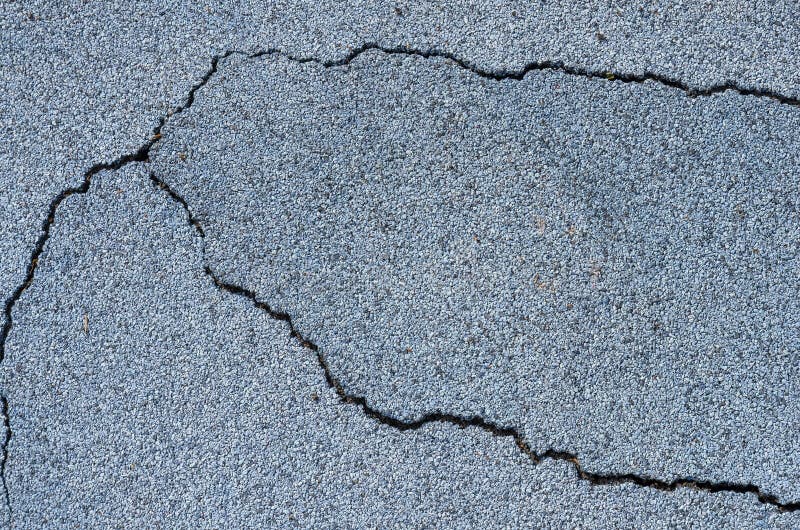 Texture of Rubberized Coating with Cracks Appeared on the Old ...