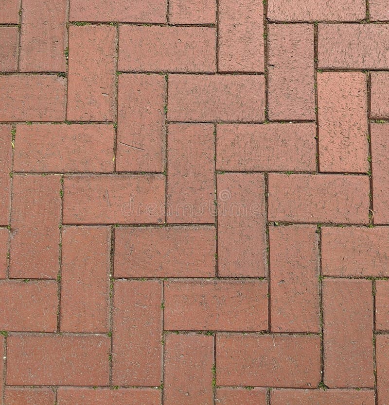 Texture of Rust Colored Pavers with Grass in between Stock Photo ...