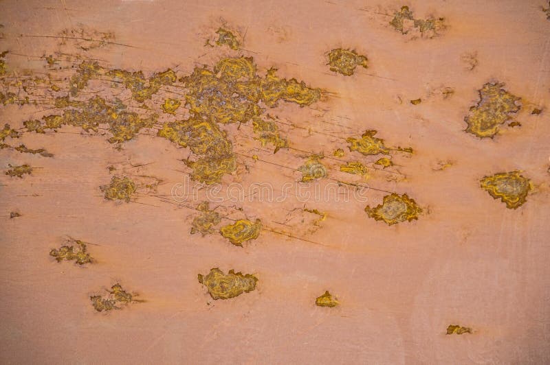 Textures of Rust Metal on a Pink Background. Yellow and Brown Spots ...