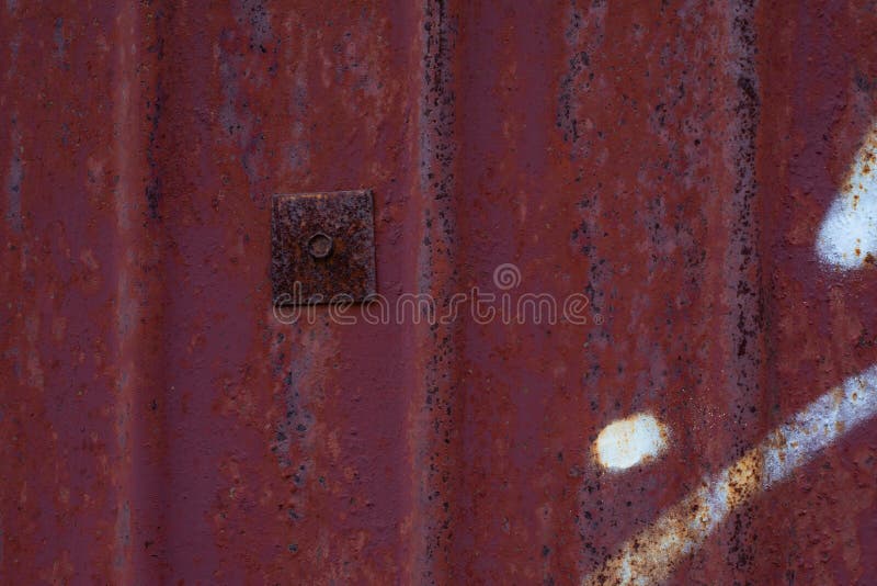 Texture of Rusty Metal Surface with a Patch. an Old Rusty Sheet of Iron ...