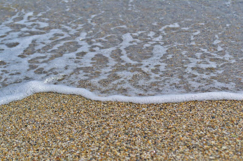 Texture of Sand with an Edge of Sea-wave Foam. Stock Photo - Image of ...