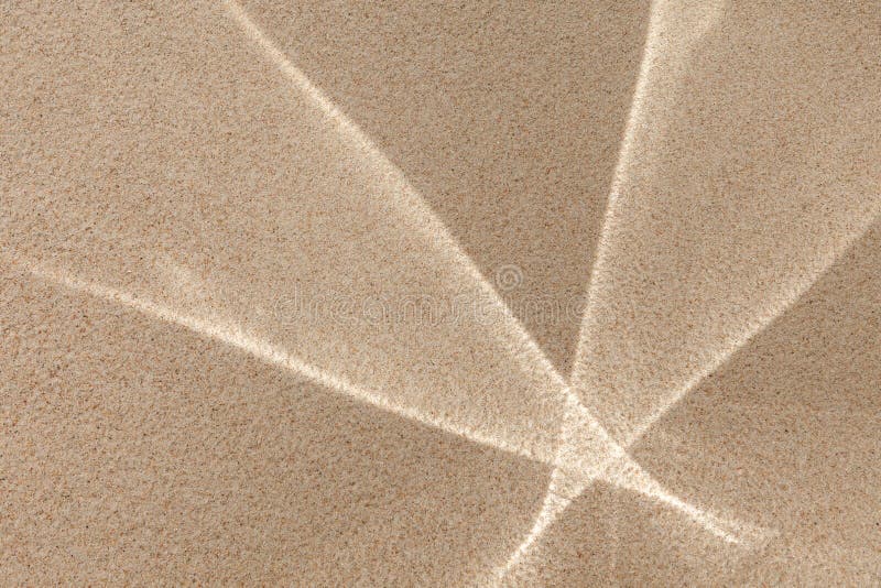The Texture of the Sand with Rays of Light. Stock Image - Image of ...