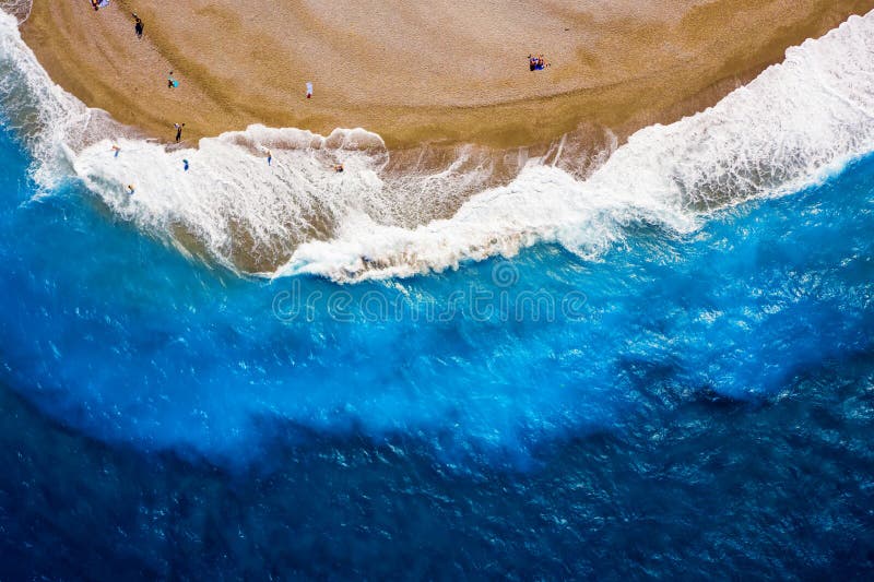 Texture of Sea Surf with White Waves, Turquoise Water and Sandy Shore ...