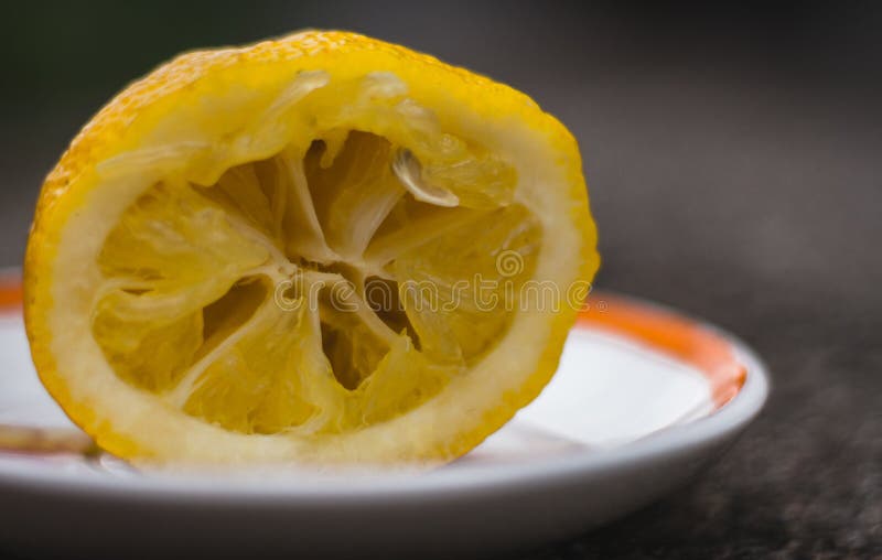 Texture of Squeezed Lemon Cut in Half, Close Up. Stock Photo - Image of ...