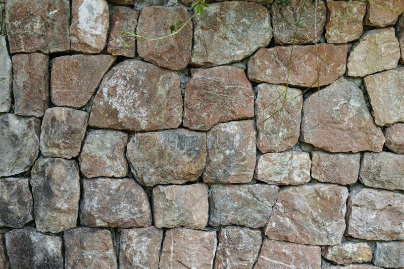 The Texture of the Stone Fence Under the Rock Stock Photo - Image of ...