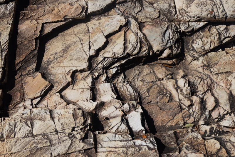 The Texture of Stone of the Rock on a Sunny Day with the Micro Shadows ...