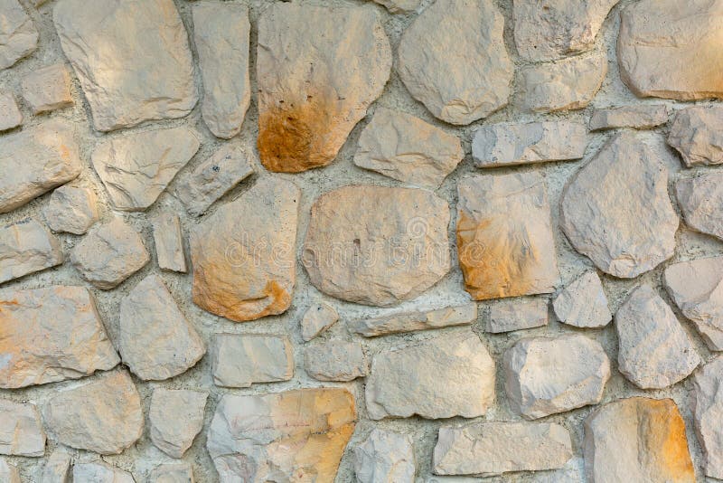 The Texture of the Stone Wall. Background Texture of the Stone Wall of ...