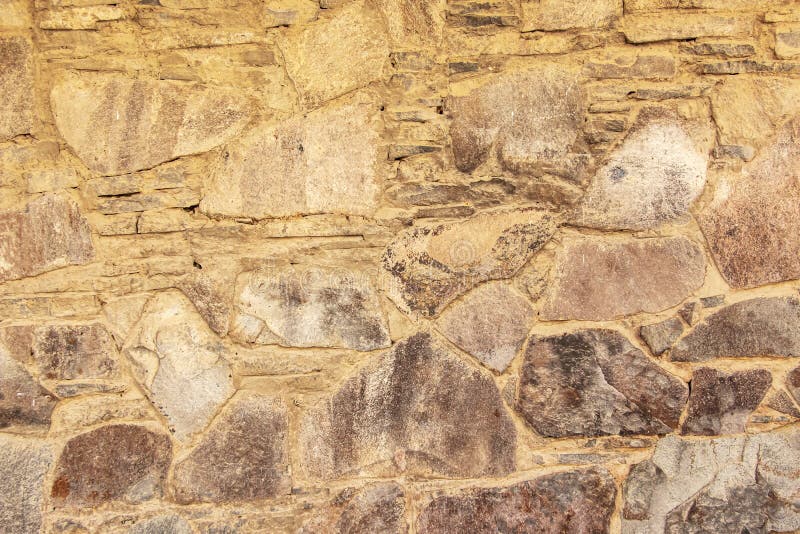 The Texture of the Stone Wall. Background Texture of the Stone Wall of ...