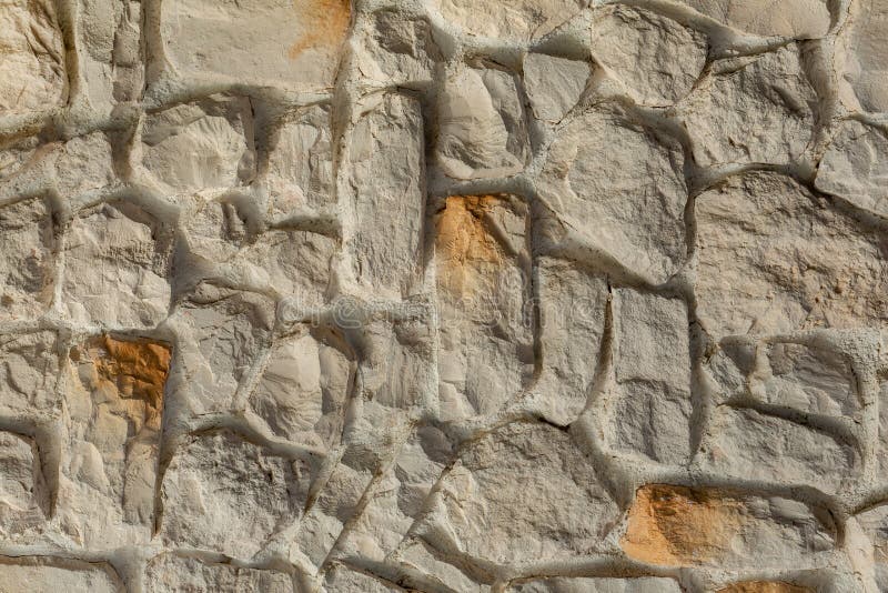 The Texture of the Stone Wall. Background Texture of the Stone Wall of ...
