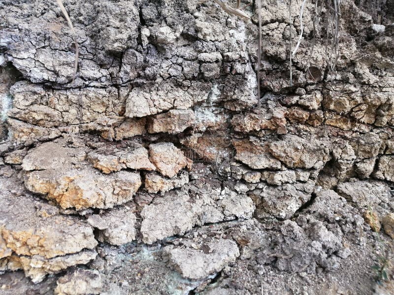 Texture of a Stone Wall. Hard Ground Wall Texture Background Stock ...