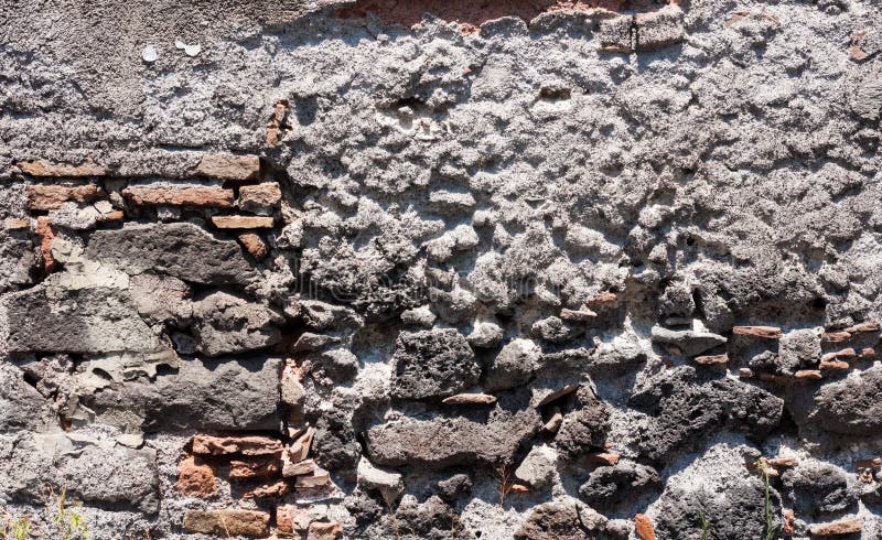 Texture of a Stone Wall of an Old Building with Crumbling Plaster ...