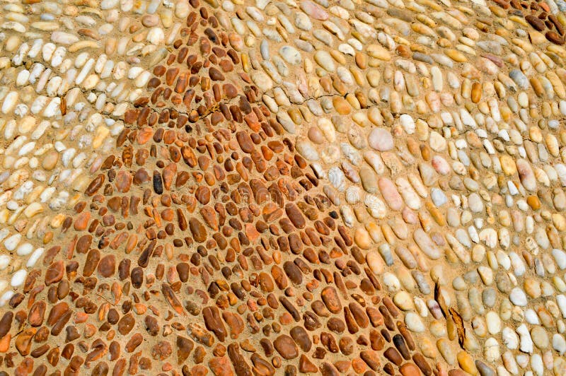 Texture of the Stone Wall, the Road from Small Round and Oval Stones ...