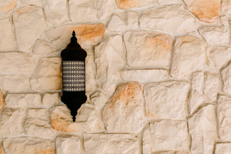 The Texture of a Stone Wall. Sconce and Stone Wall As Background or ...