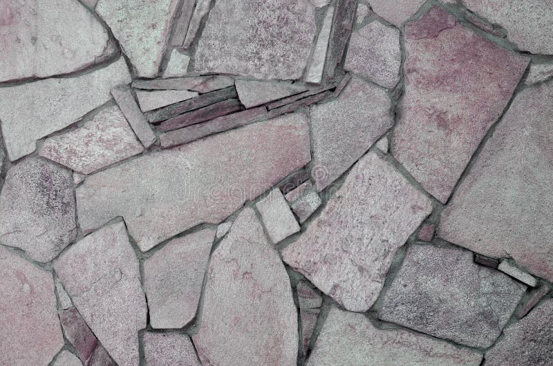 The Texture of a Strong Stone Wall of Many Concreted Stones of Various ...