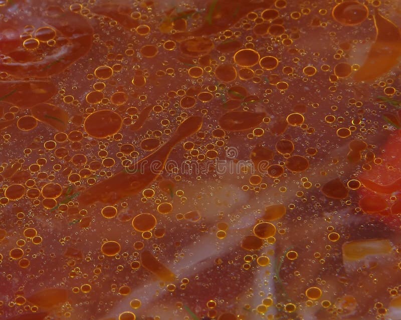 Texture the Surface of the Soup with Vegetables and Grease on the ...