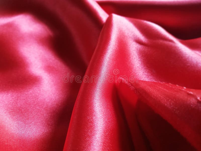 Texture and Surface of Wavy and Shiny Red Silk Satin Fabric, Suitable ...