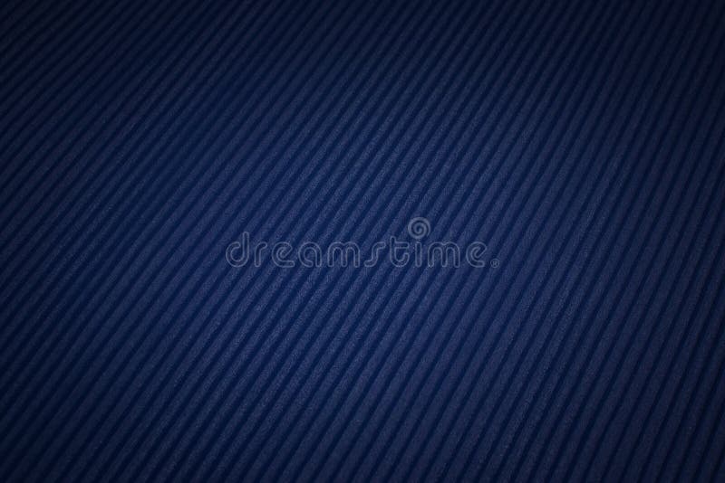 The Texture of the Synthetic Fabric is Dark Blue. Plisse. Background ...