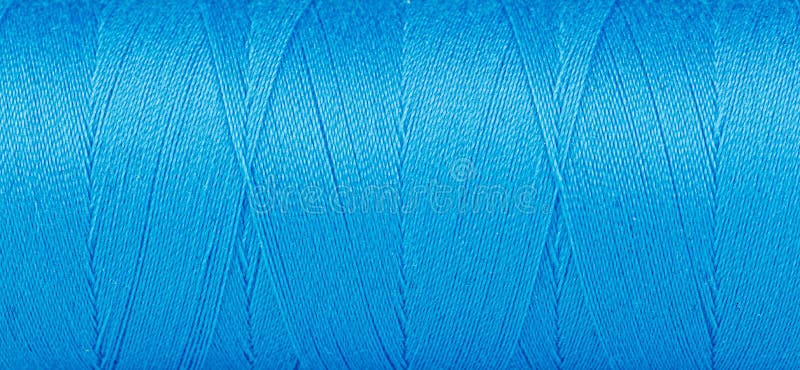 A Spool of Blue Thread on a Yellow Background. Sewing Thread. Shoe ...