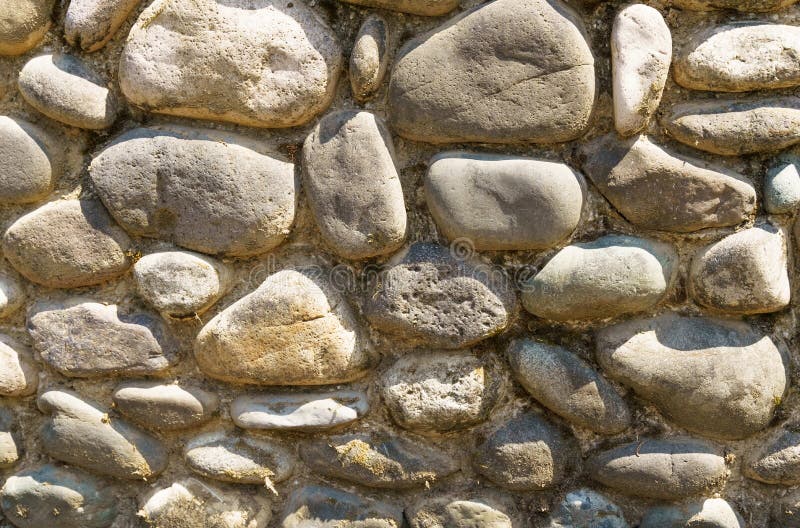 The Texture of the Wall of Brown Stone Masonry. Stock Photo - Image of ...