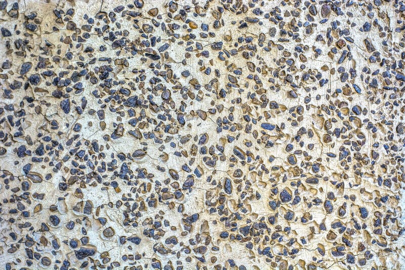 The Texture of a Wall of Concrete with Granite Stones of Different ...