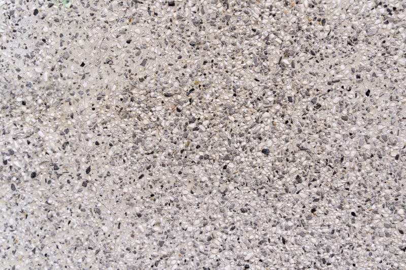 The Texture of a Wall Made of Small Light Stone with Concrete. Stock ...