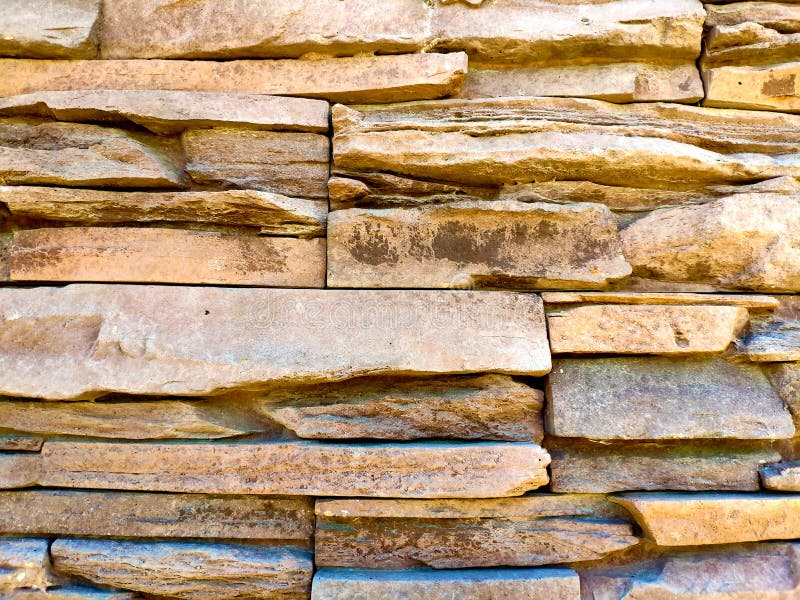 The Texture of the Wall is Made of Uneven Stones of Different Sizes of ...