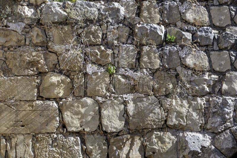 Texture of Wall Surface Made of Unevenly Cut Jerusalem Stones. Stock ...