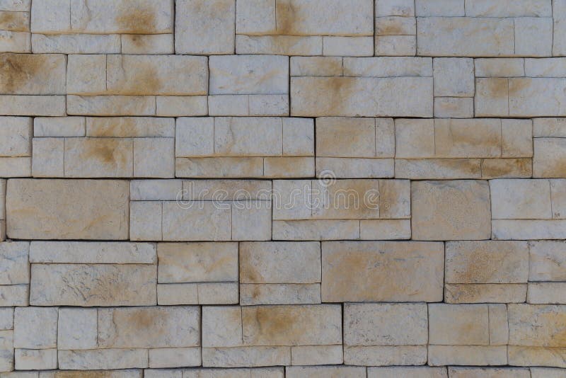 The Texture of the Wall of a Variety of Colored Stones Stock Image ...