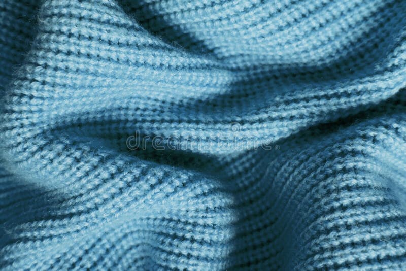 Texture of Warm Knitted Fabric. the Fabric that is Folded in Waves ...