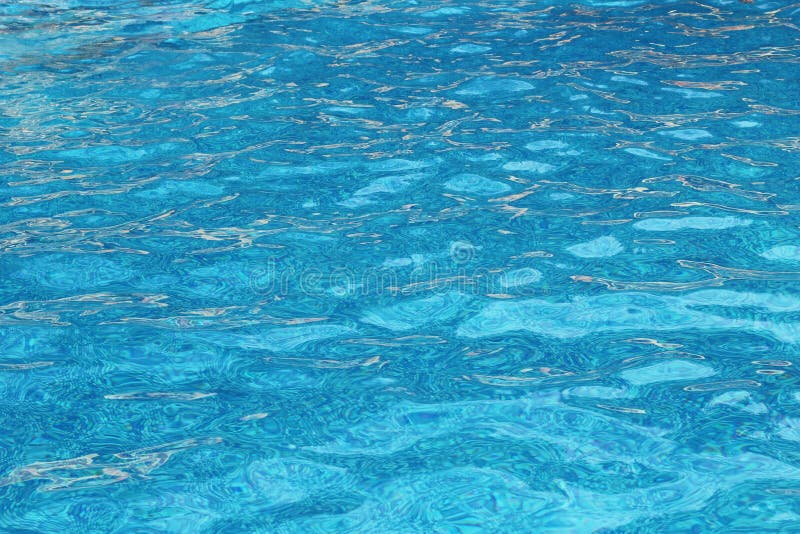The Texture of Water in a Blue Swimming Pool Water Waves in a Swimming ...