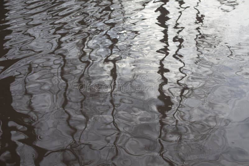 The Texture of the Water. a Puddle in the City Stock Image - Image of ...