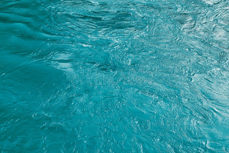 The Texture of the Waves of Blue Color of Fast-flowing Water in the ...